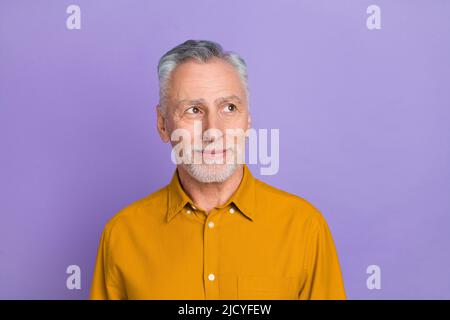 Photo of curious grey hairdo aged lady look empty space wear striped ...