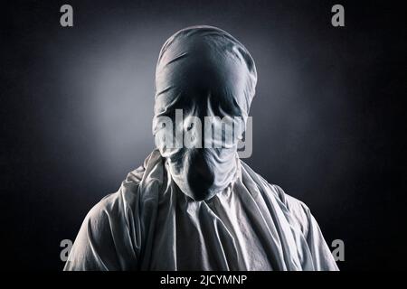 Portrait of a scary ghost over dark misty background Stock Photo - Alamy