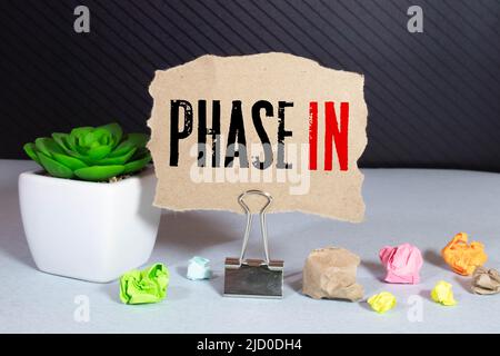 Time to phase 2 symbol. Concept word Phase 1 2 3 on wooden block ...