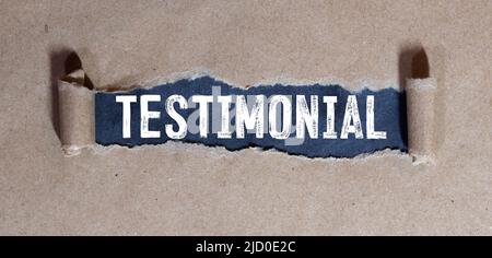 Testimonial - word from wooden blocks with letters, statement about the ...