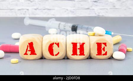 The word ache written with dices in front of a purple background with ...