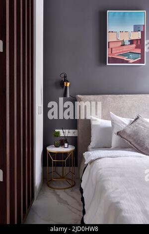 Photographs of a bed in a bedroom with flash light Stock Photo - Alamy