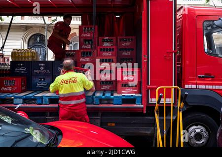 Madrid, Spain. 20th May, 2022. Delivery truck workers offload American ...