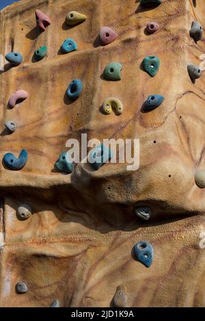 Climbing gym outdoor rock climbing wall pattern Stock Photo - Alamy