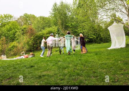 People dancing around midsummer maypole Stock Photo - Alamy