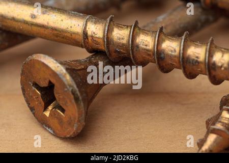 Brassed Speed Drive screws macro Stock Photo - Alamy