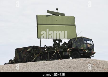 A U.S. Air Force AN/TPS-75, deployable field radar system, scans the ...