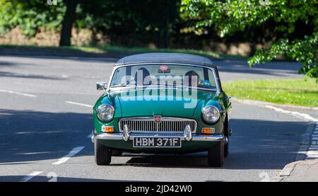 Green MG MGB convertible classic sports car in period location Stock ...