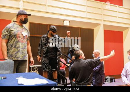 Labor leader Chris Smalls, center, president of Amazon Labor Union ...
