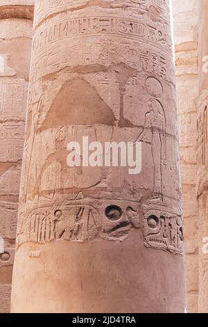 Real ancient Egyptian hieroglyphics engraved in a stone wall at Karnak ...