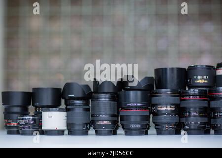Nikon Canon lenses different focal lengths display Stock Photo - Alamy