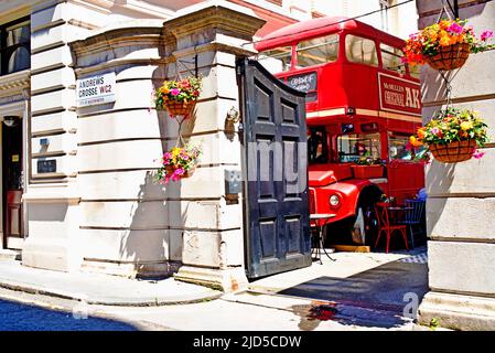 Routemaster Bus in beer garden of the Old Bank Pub, Fleet Street ...