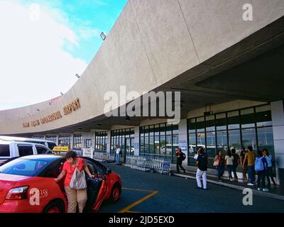 Crowd of people waiting outside Ninoy Aquino International Airport NAIA ...