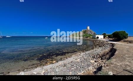 Uncovered excavations with an old tower in the background near the town ...