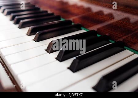 Piano keys side view Stock Photo - Alamy