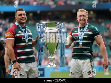 Leicester Tigers' Tommy Reffell (left) is tackled by Harlequins' Nick ...