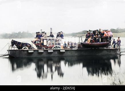 Two sight-seeing excursion coaches are carried by steam ferry across ...