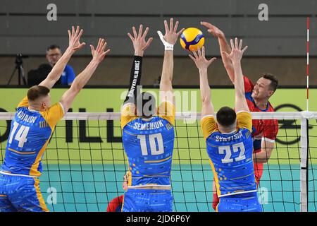 Jan Galabov of the Czech Republic spikes during the bronze medal match ...