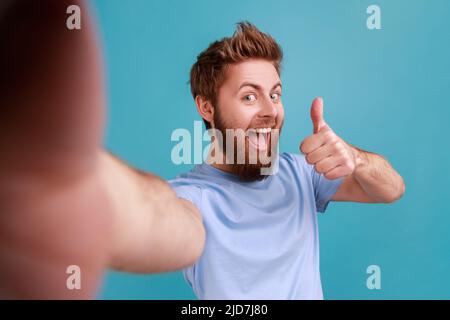 Photo of good mood satisfied guy with ginger hairstyle dressed khaki ...