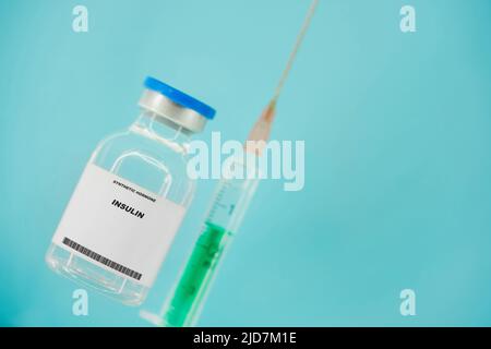 Insulin. Test tube with artificial hormone on pink background Insulin ...
