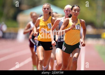 Dalia Frias of Mira Costa (right) and Sam McDonnell of Newbury Park lead the girls 1,600m during ...
