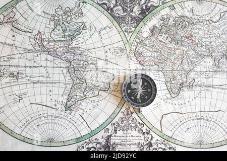 Ancient map of Europe and antique compass. Map is from 1786 and is out ...