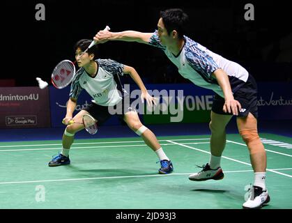South Korea's Won Ho Kim, right, and Seung Jae Set play Singapore' s Koh Eng Keat Wesley and ...