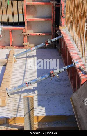 Formwork for a concrete wall was secured against slipping with struts ...