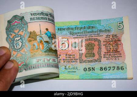 Old Five Rupee notes combined on the table, India money on the rotating ...