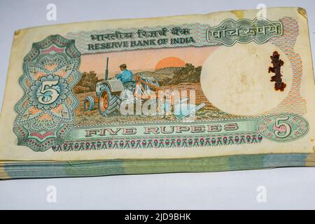 Old Five Rupee notes combined on the table, India money on the rotating ...