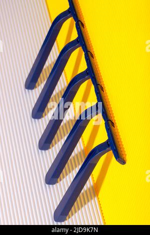 Abstract still life with razors on a colored background Stock Photo - Alamy