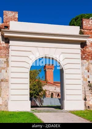 Medieval tower seen through Pisa ancient walls gate Stock Photo - Alamy