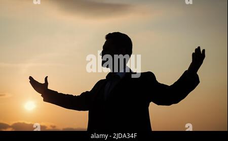 personal achievement goal. man silhouette on sky background. confident ...