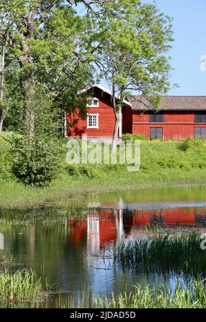 Old wood buildings at Fagervik manor from 1762 in Inkoo, southern ...