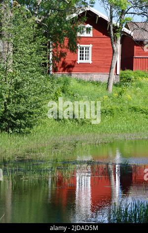 Old wood buildings at Fagervik manor from 1762 in Inkoo, southern ...