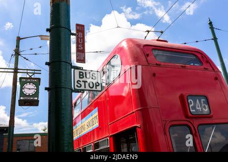 Old 1950s red double decker bus at a bus stop. UK 2022 Stock Photo - Alamy