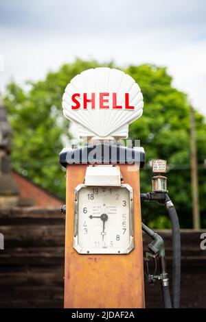 Old fashioned Shell Petrol pump Stock Photo - Alamy