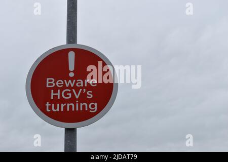 Road sign: caution lorries turning Stock Photo - Alamy