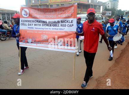 People participate in a walking event in Qinhuangdao City, north China ...