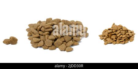 triangular pieces of animal food on a white background. Pile of ...