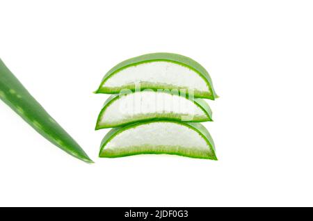 Small pieces of an aloe vera leaf on white background. Natural medicine ...