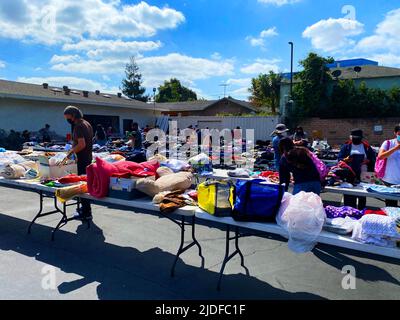 An outdoor community yard sale Stock Photo - Alamy