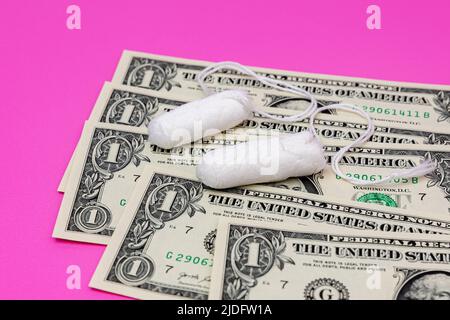 Tampons and cash money. Tampon shortage, tax, pink tax and feminine ...