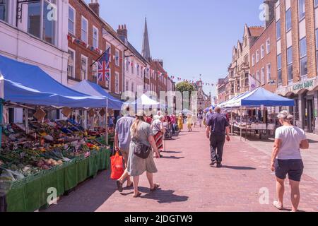 Chichester city centre, traditional market stalls Stock Photo - Alamy