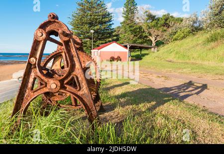 Upturned metal fishing boats (Tinnies) hauled up on the shore at ...