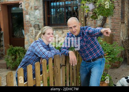 Getting to know the neighbors at country houses in village Stock Photo ...