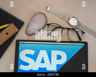 In this photo illustration SAP SE logo seen displayed on a tablet Stock ...
