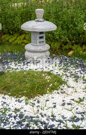Walking path and zen-like white pagoda gravel landscape in Japanese ...