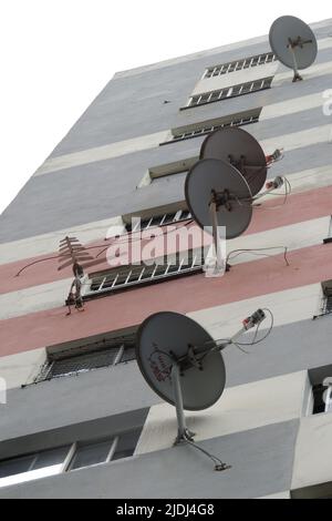 Antenna for TV receiver attached to the facade of the house against the ...