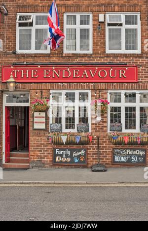 The Endeavour pub, Whitby, Yorkshire, England, flying Union Jack flag ...